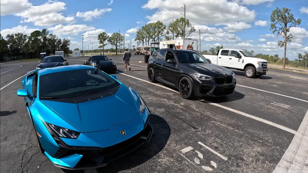 Lamborghini Huracan Tecnica vs. BMW X3 M: Drag Race Showdown - DAX Street
