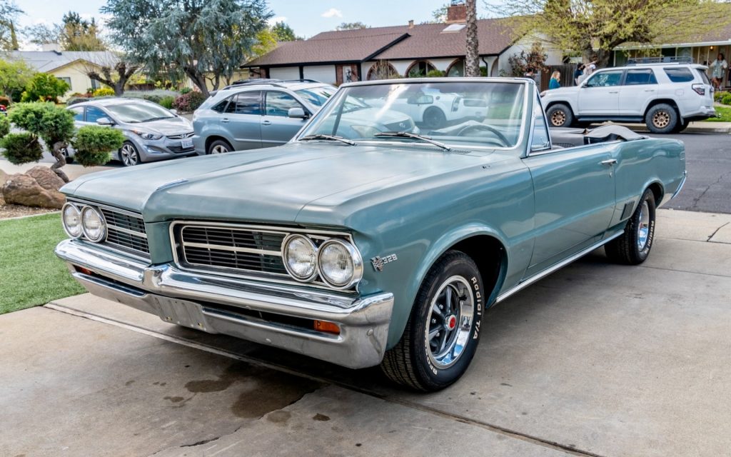 1964 Automotive Milestones: Mustang, GTO, and LeMans Evolution - DAX Street