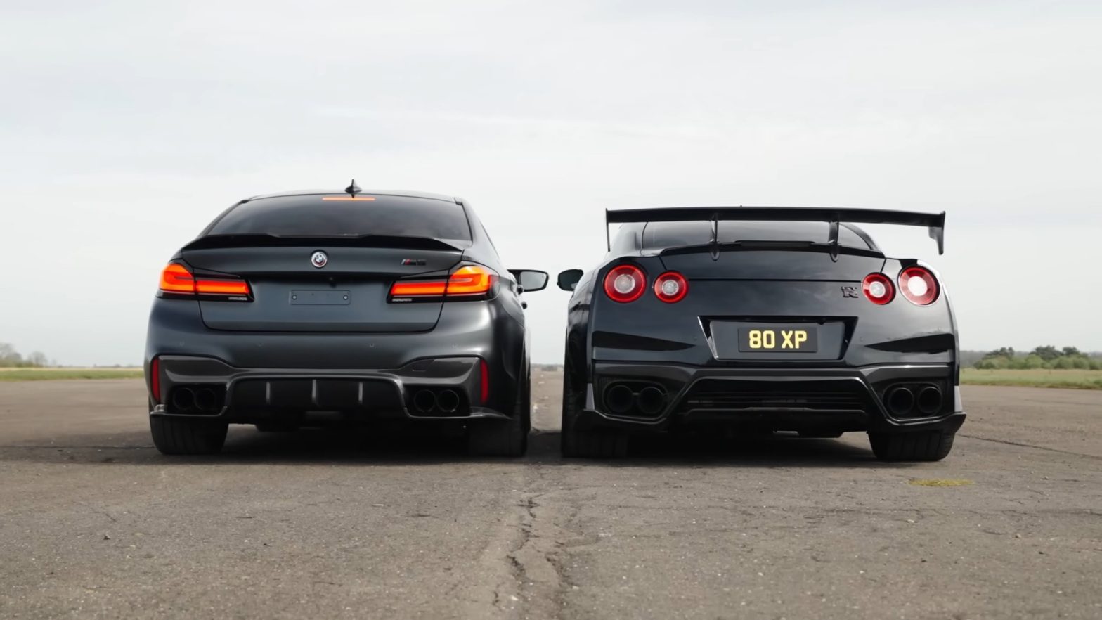 Nissan GT-R vs. BMW M5: Battle of Automotive Titans - DAX Street