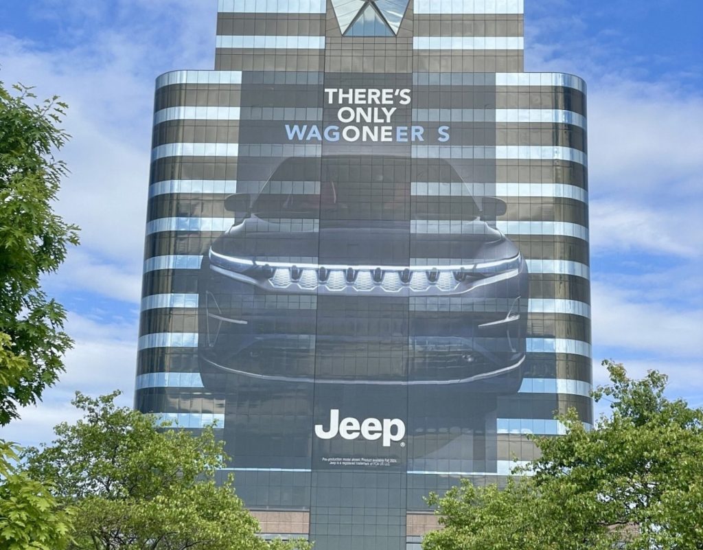 Stellantis Innovates: Jeep Wagoneer S EV Adorns HQ Tower - DAX Street